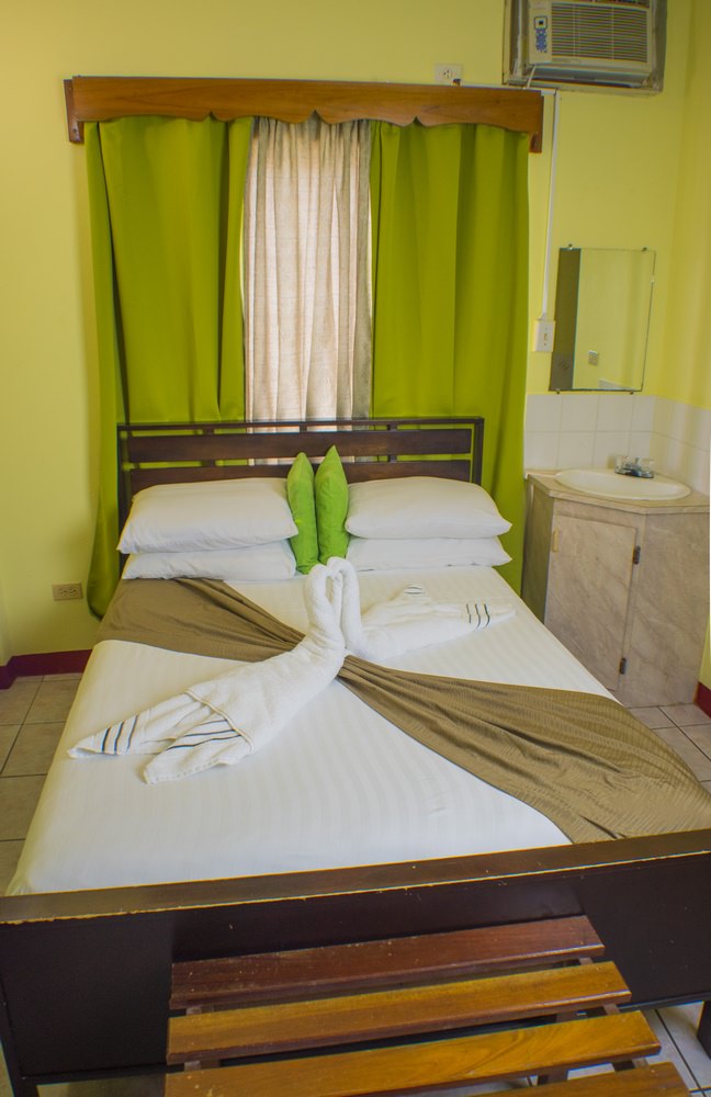 Belcove Hotel Belize City | Affordable Riverside Accommodation | English